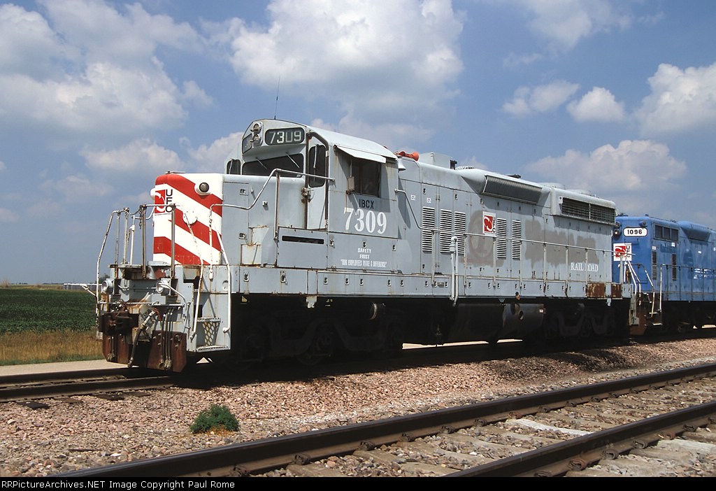 IBCX 7309, ex C&O SD18, working at United Farmers CO-OP